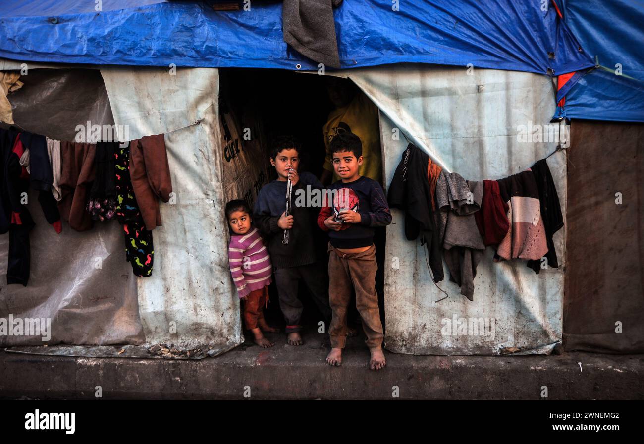 Rafah, Gaza. 29th Feb, 2024. Displaced Palestinian children stand ...