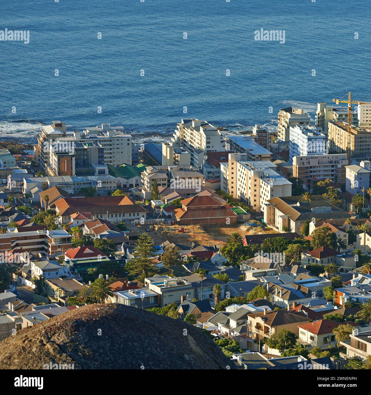 City, building and sea or aerial with development infrastructure or ...