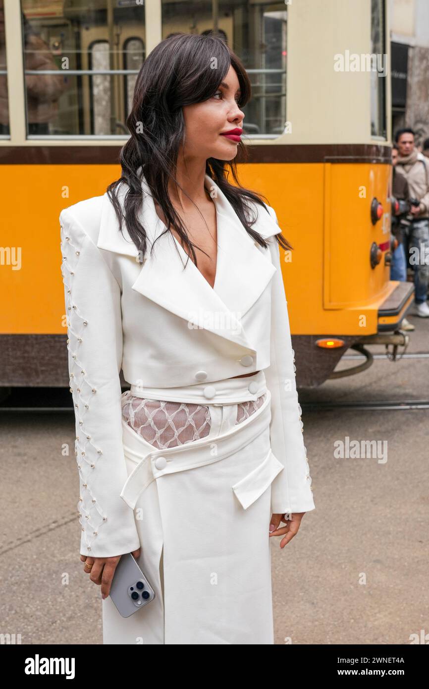Milan, Italy. 24th Feb, 2024. Street Style: A model is seen outside the ...