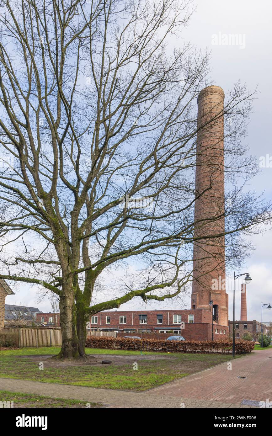 Modern newly build houses surrounding the old towers of the ENKA ...
