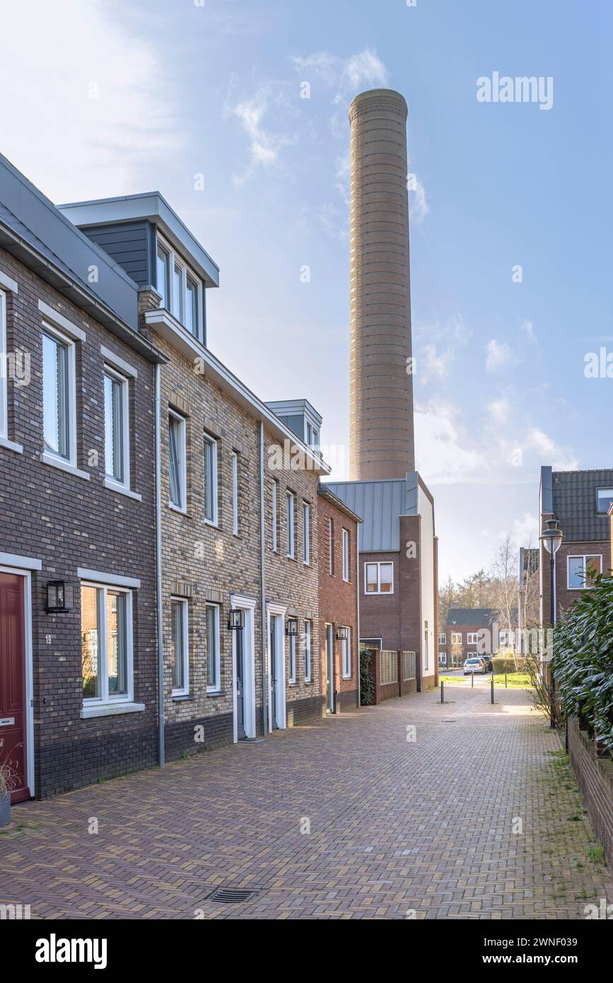 Modern newly build houses surrounding the old towers of the ENKA ...
