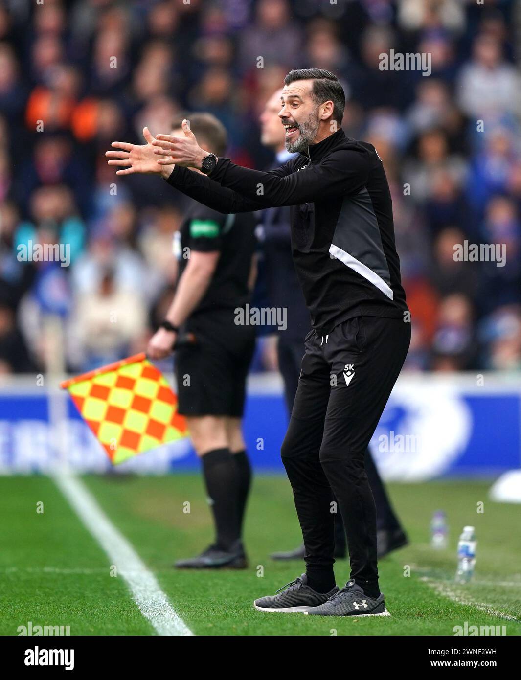 Motherwell manager Stuart Kettlewell gestures on the touchline during ...