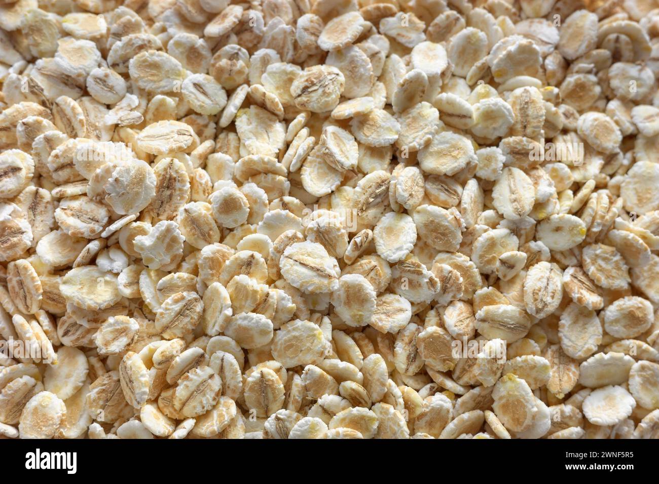 Close up photo of barley flakes, selective focus, food background Stock ...