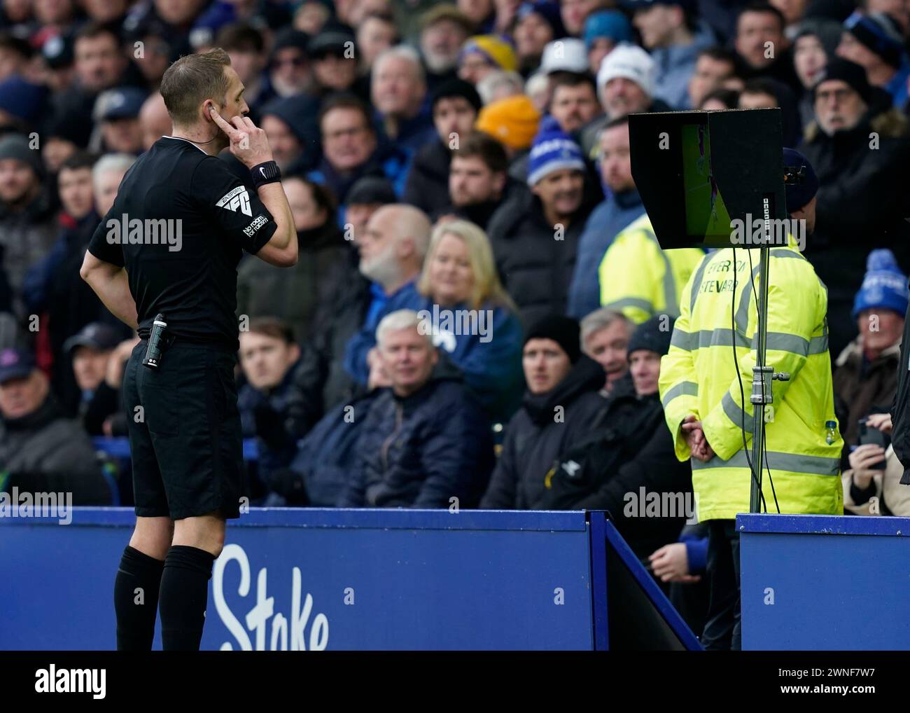Liverpool, UK. 2nd Mar, 2024. Referee Craig Pawson watches the VAR ...