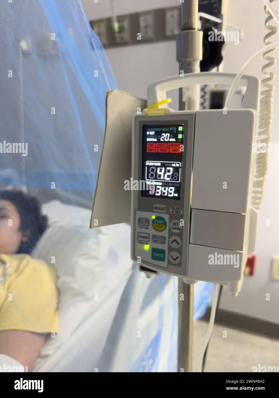 IV machine with screen display in hospital room close up view Stock ...