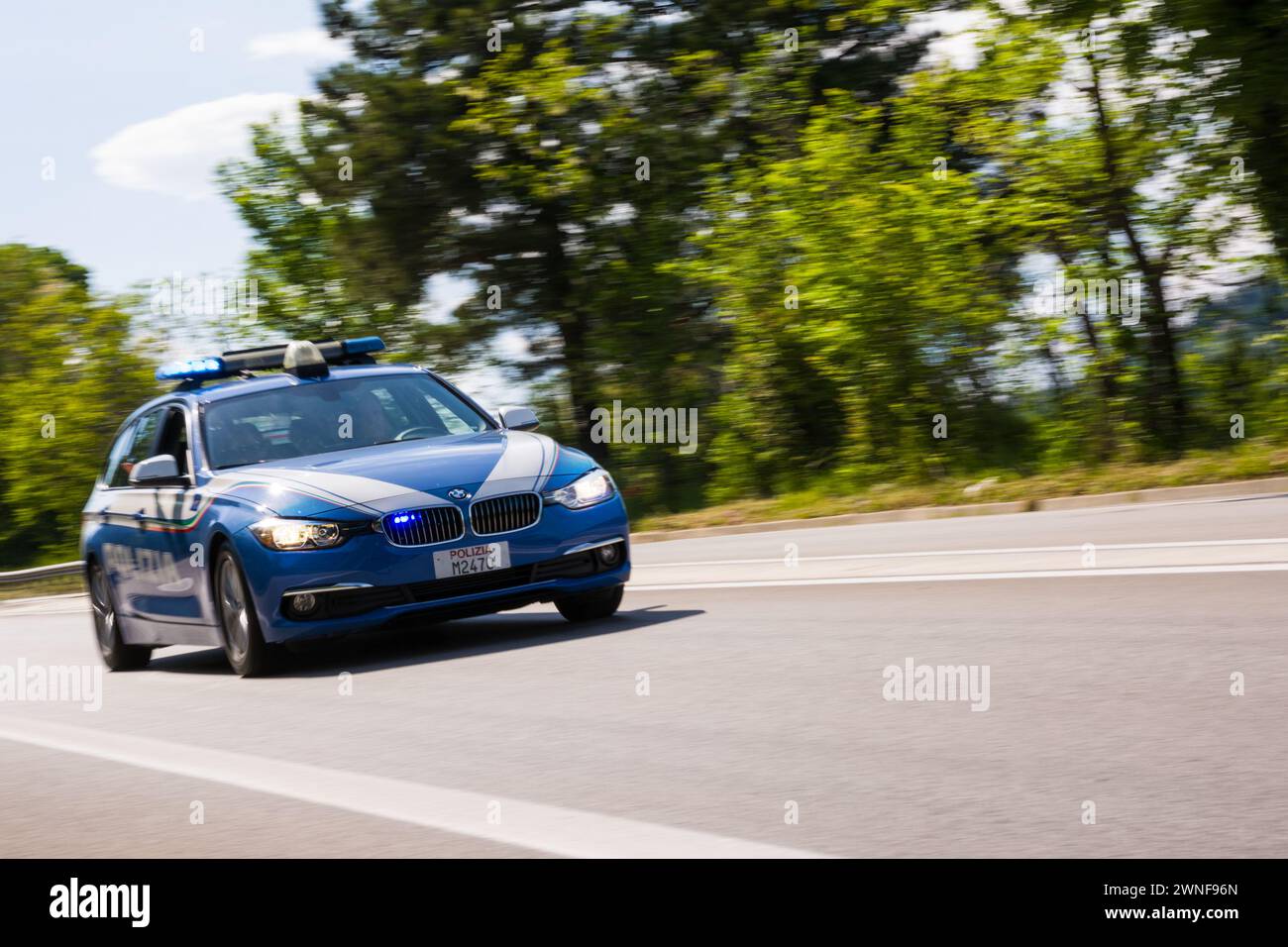Chieti, Italy - 7 May 2023: Police car racing along the street, with ...