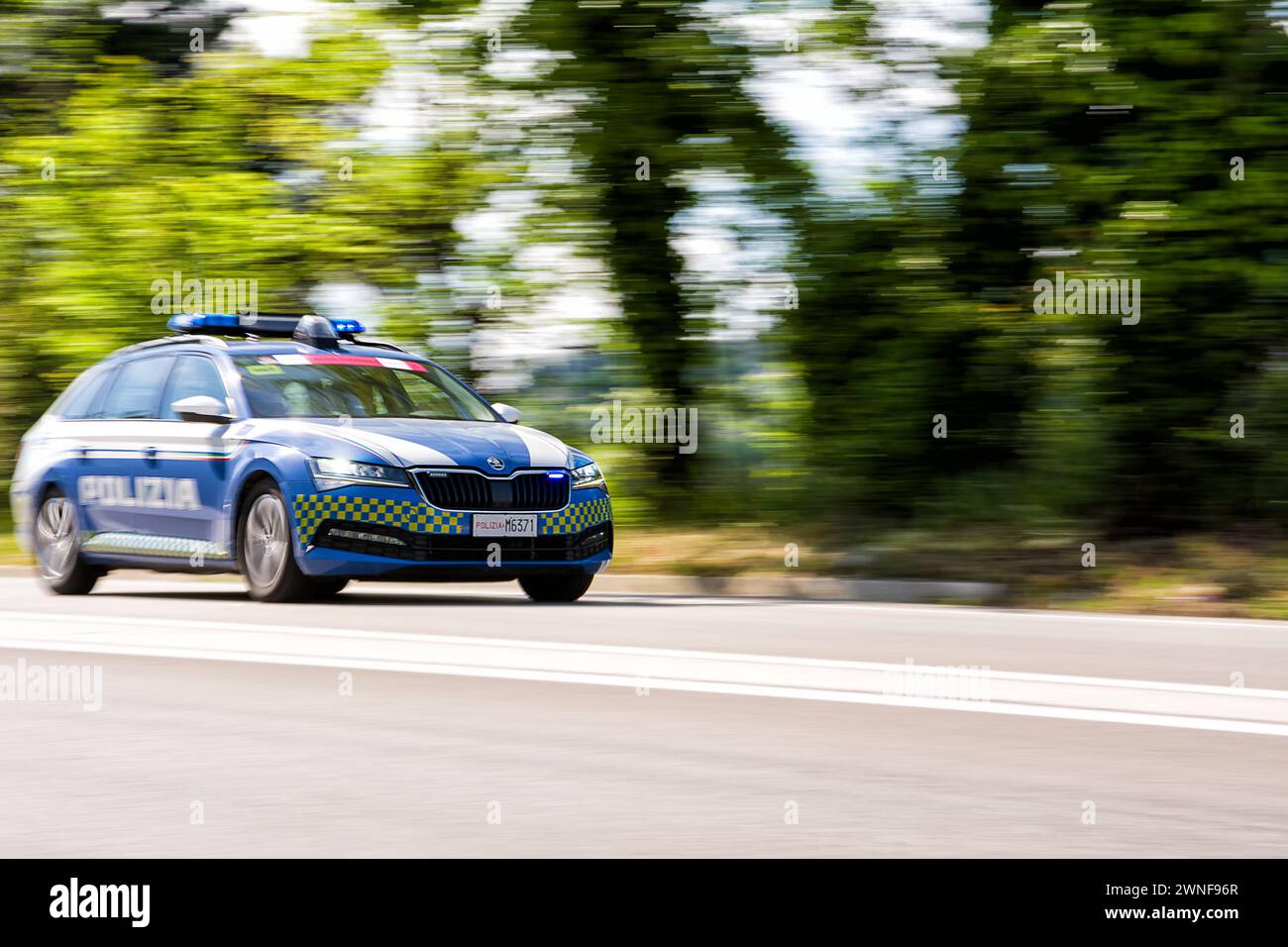 Chieti, Italy - 7 May 2023: Police car racing along the street, with ...