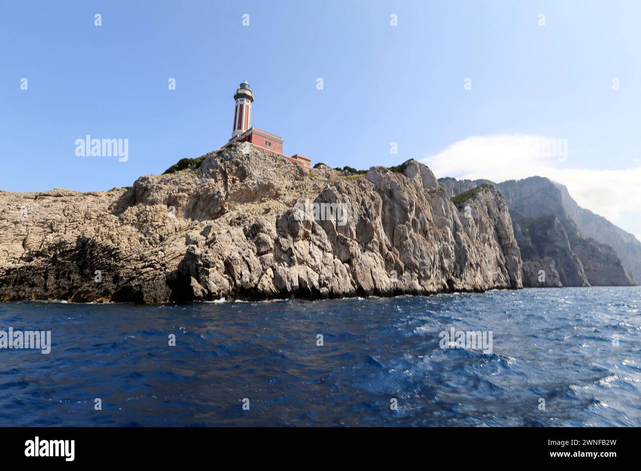 view of lighthouse on the slope in front the Mediterranean sea of the ...
