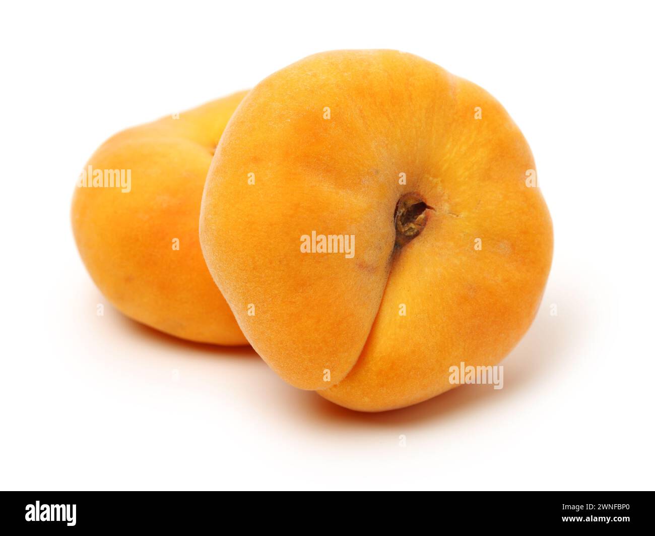 chinese flat peaches on white background Stock Photo - Alamy