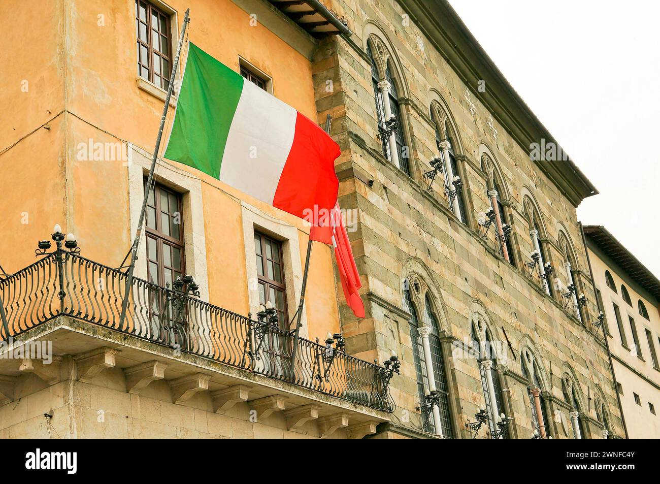 Cityscape of Pisa, Toscany, Italy with old buildings and italian flag ...