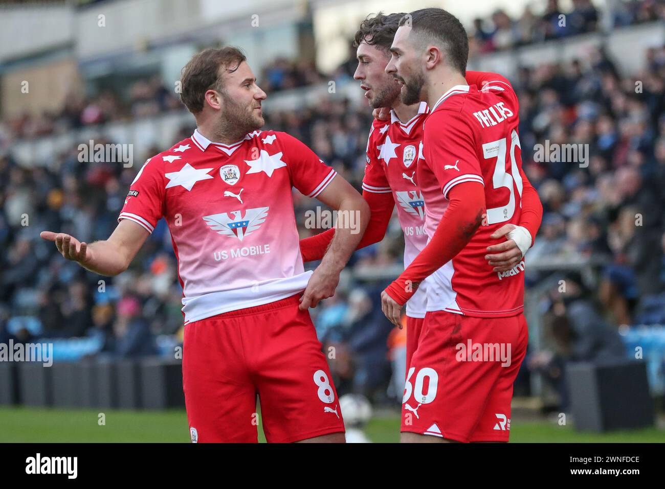 Corey O'Keeffe of Barnsley celebrates his goal to make it 2-3 during ...