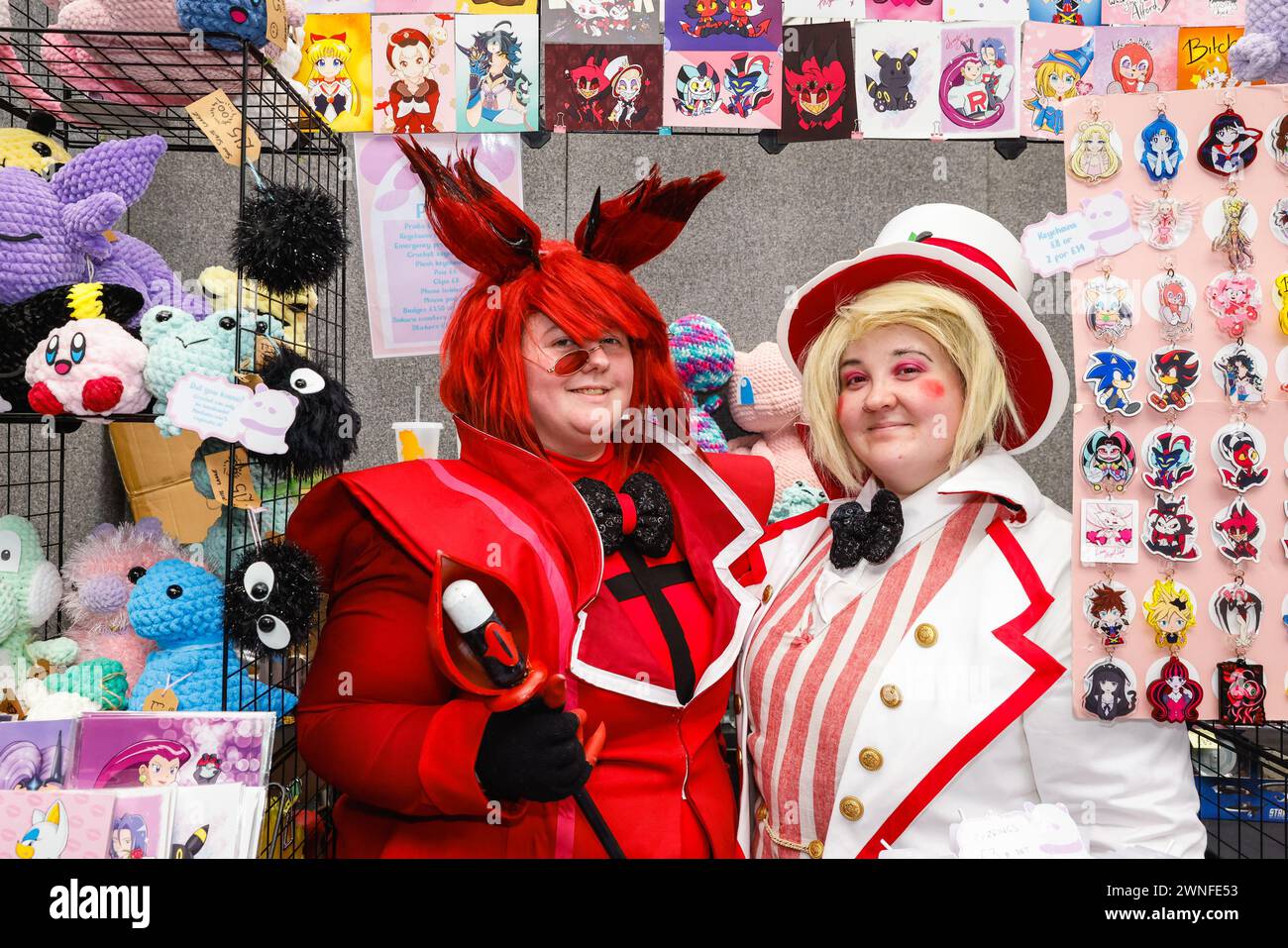 London, UK. 02nd Mar, 2024. Two exhibitors from Pastel Panda Bum peek ...