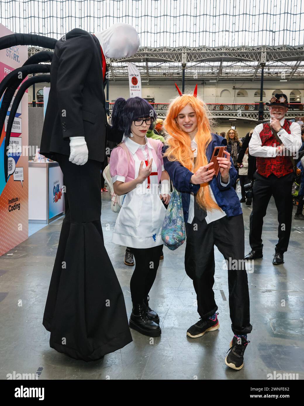 London, UK. 02nd Mar, 2024. Visitors in their costumes. Cosplayers ...