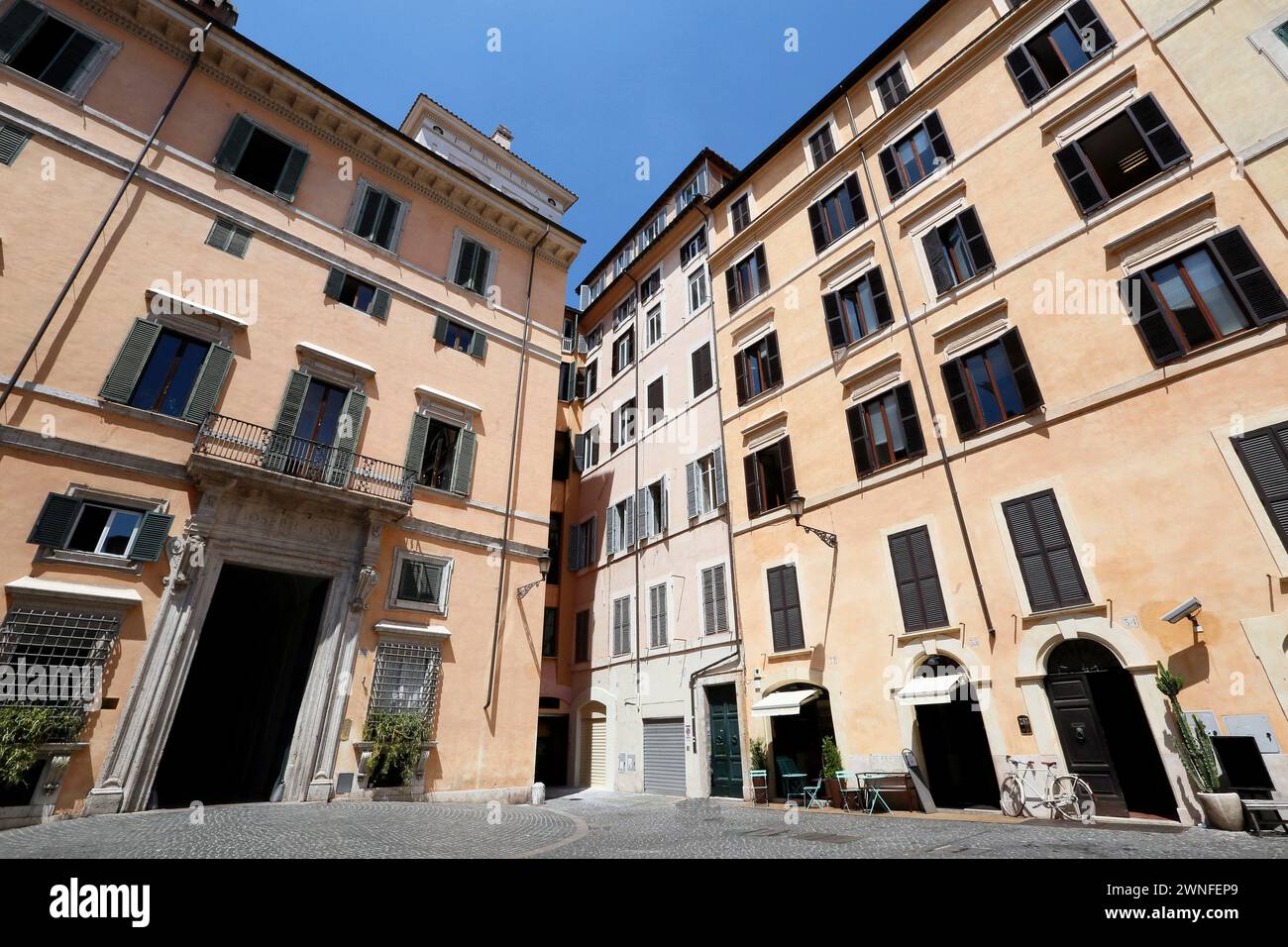 facade of old residential building in a square. Rome, Italy Stock Photo ...