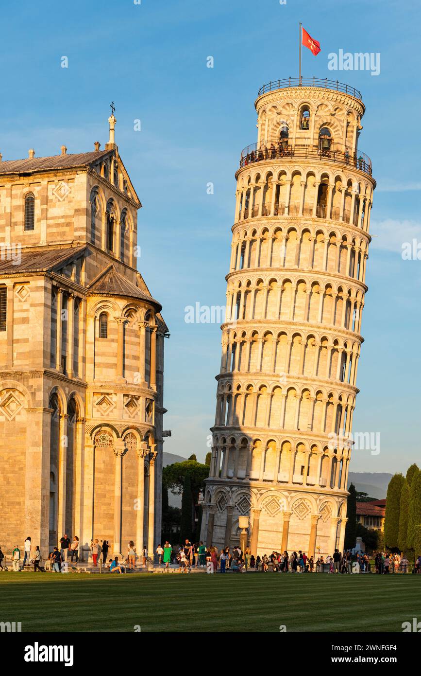 The Leaning Tower of Pisa next to the side aisle of the cathedral in ...