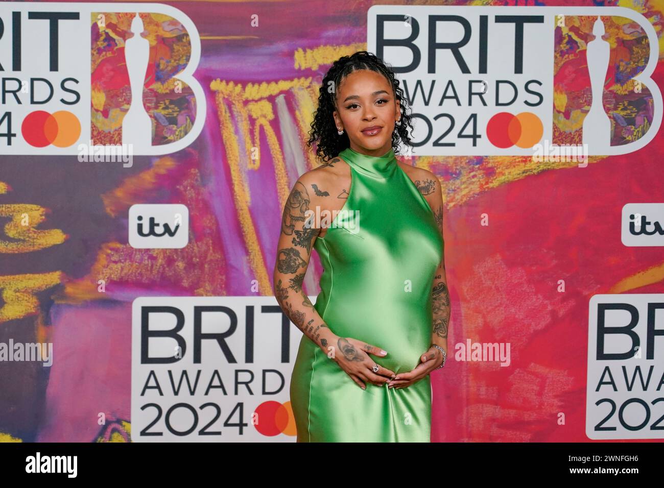Yinka Bokinni poses for photographers upon arrival at the Brit Awards ...