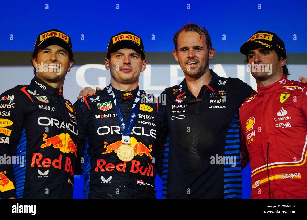 Winner Max Verstappen, second placed Sergio Perez of Red Bull and third ...