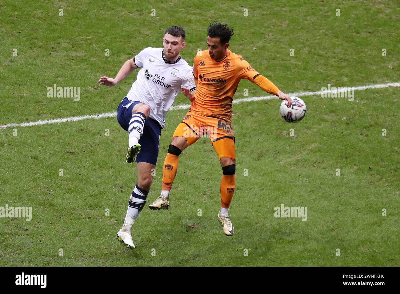 Preston North End's Ben Whiteman (left) and Hull City's Fabio Carvalho ...