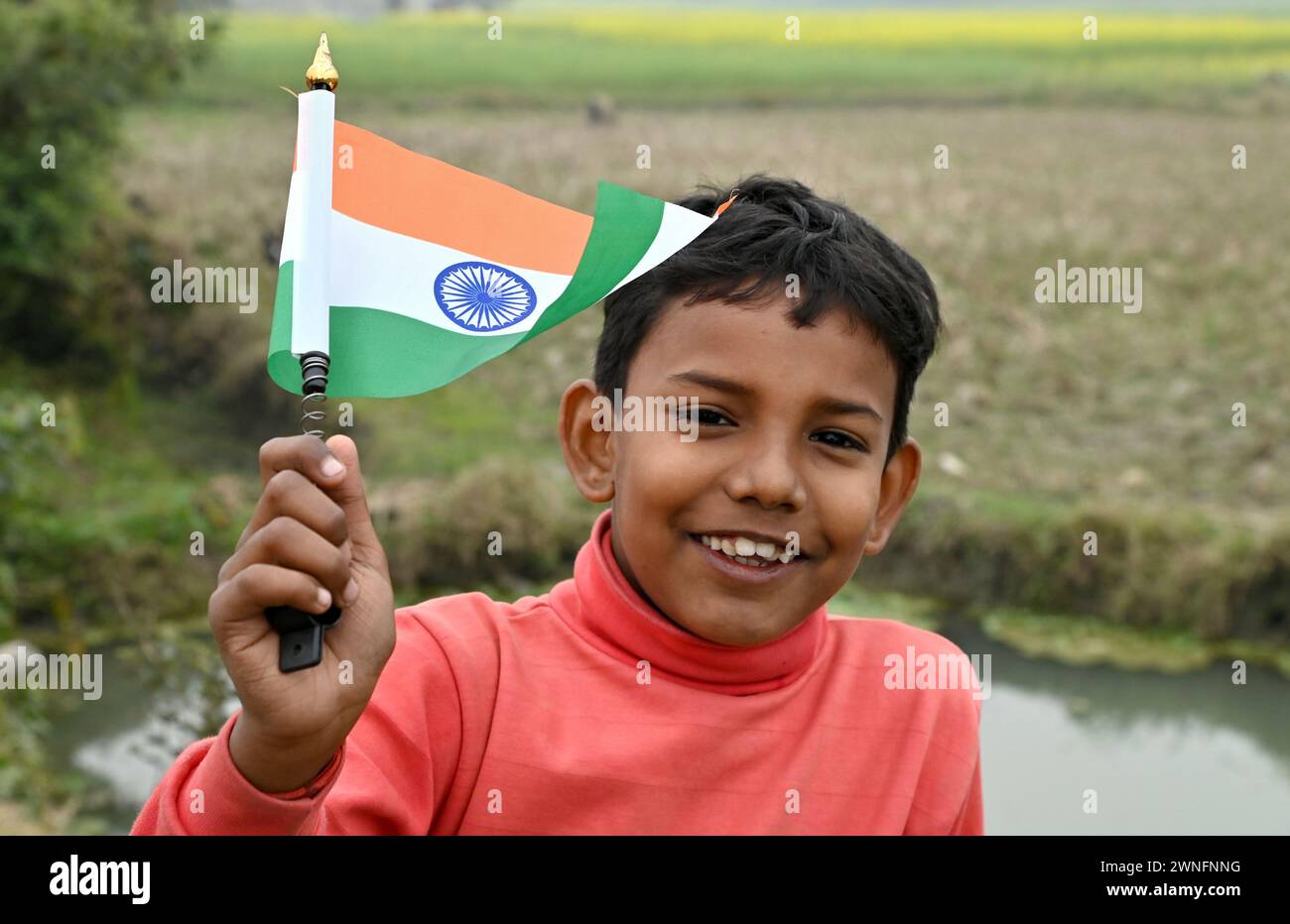 Happy moments of the rural village little boy with National Flag at ...