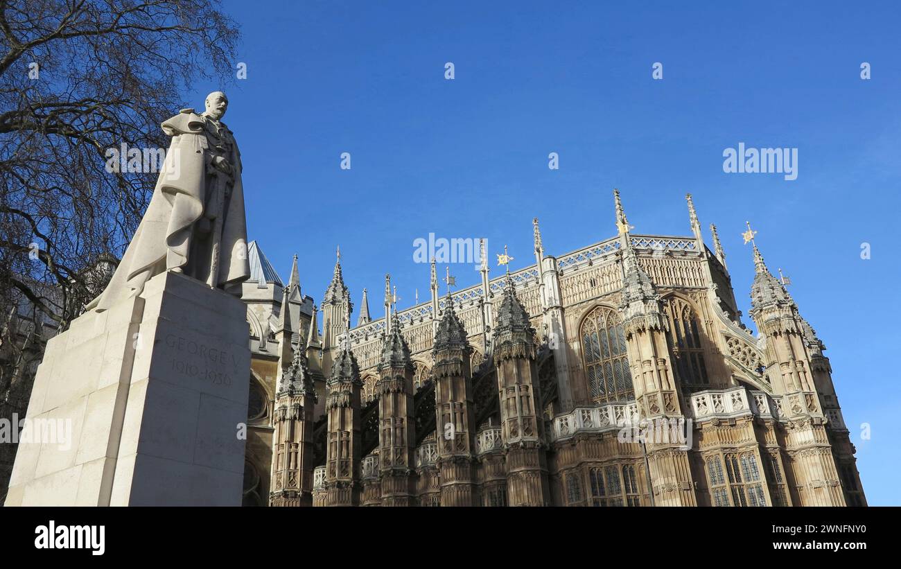 cathedral of Westminster and statue of george V. London, England Stock ...