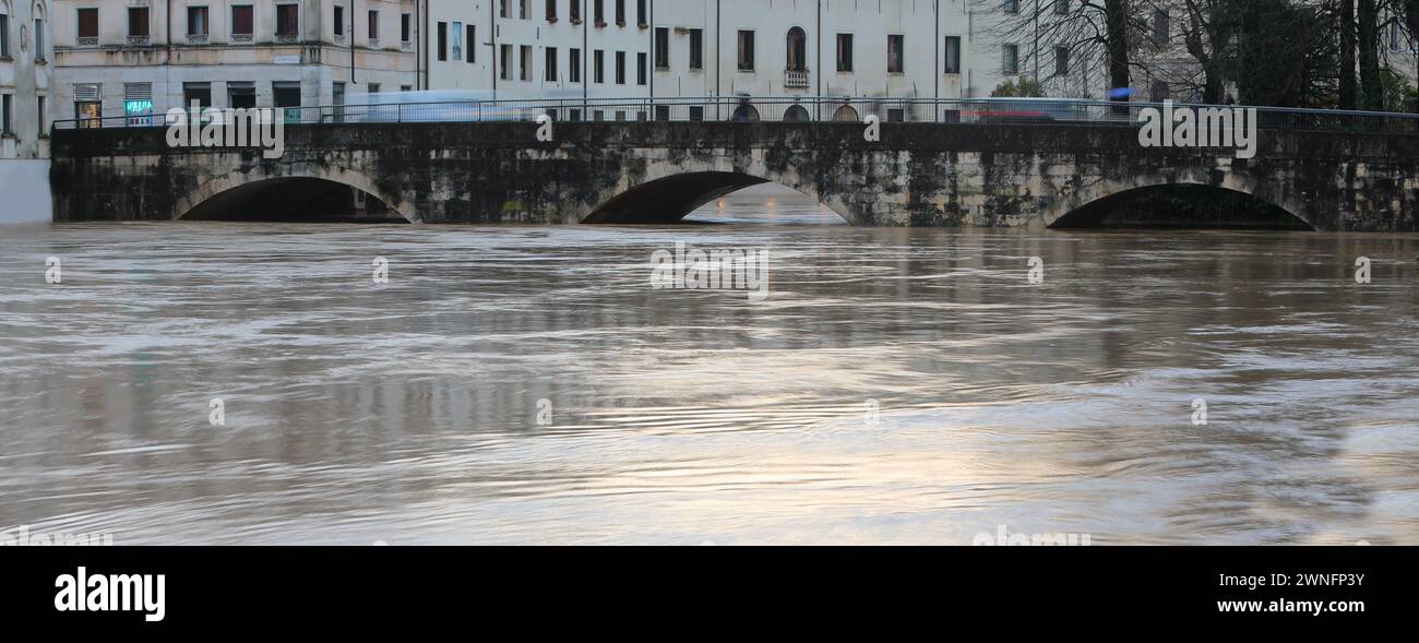 almost submerged arches of the Old Bridge called Ponte Pusterla in the ...