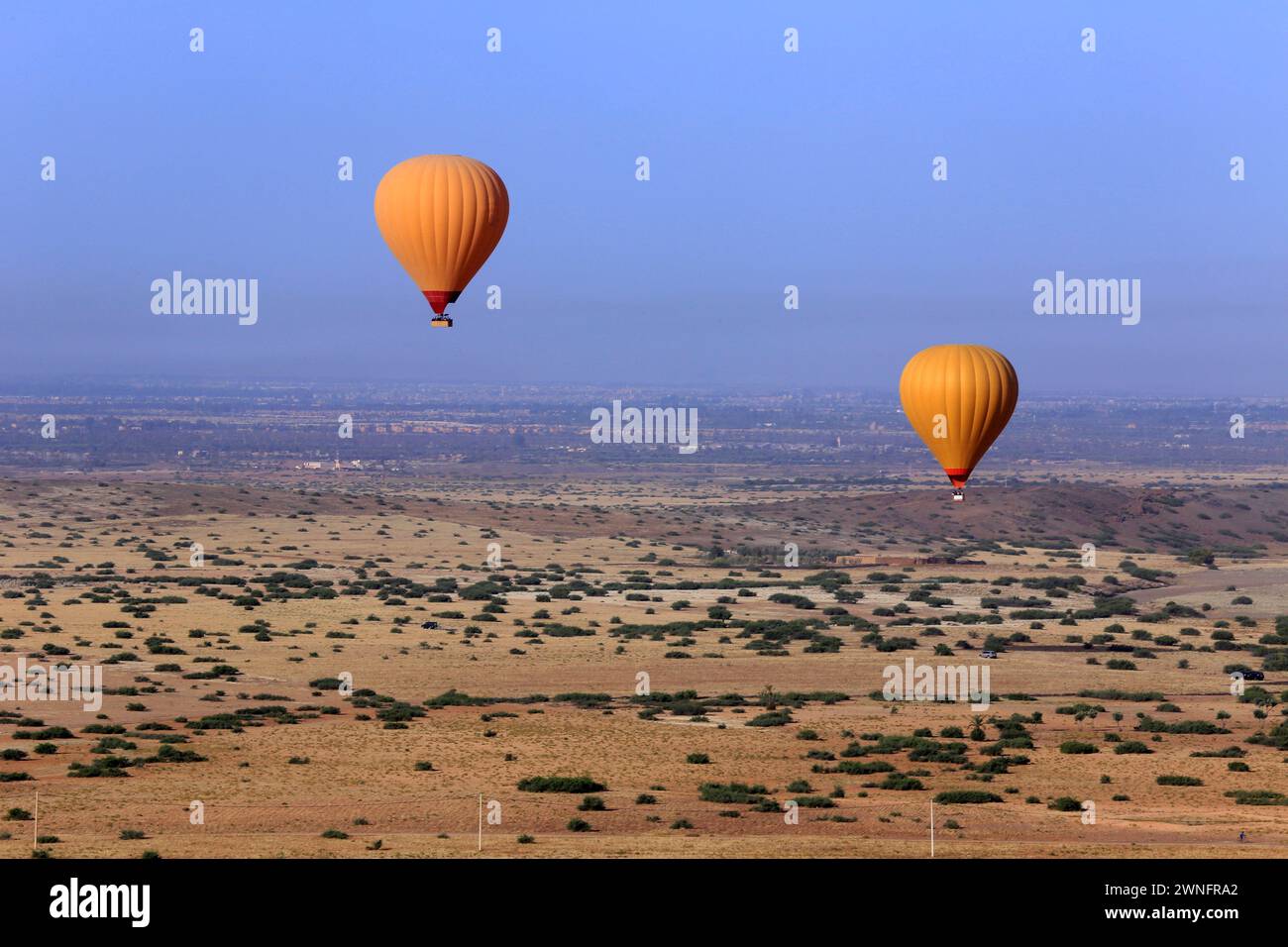 hot air balloon fly over the Marrakesh desert of Agafay on Morocco with ...