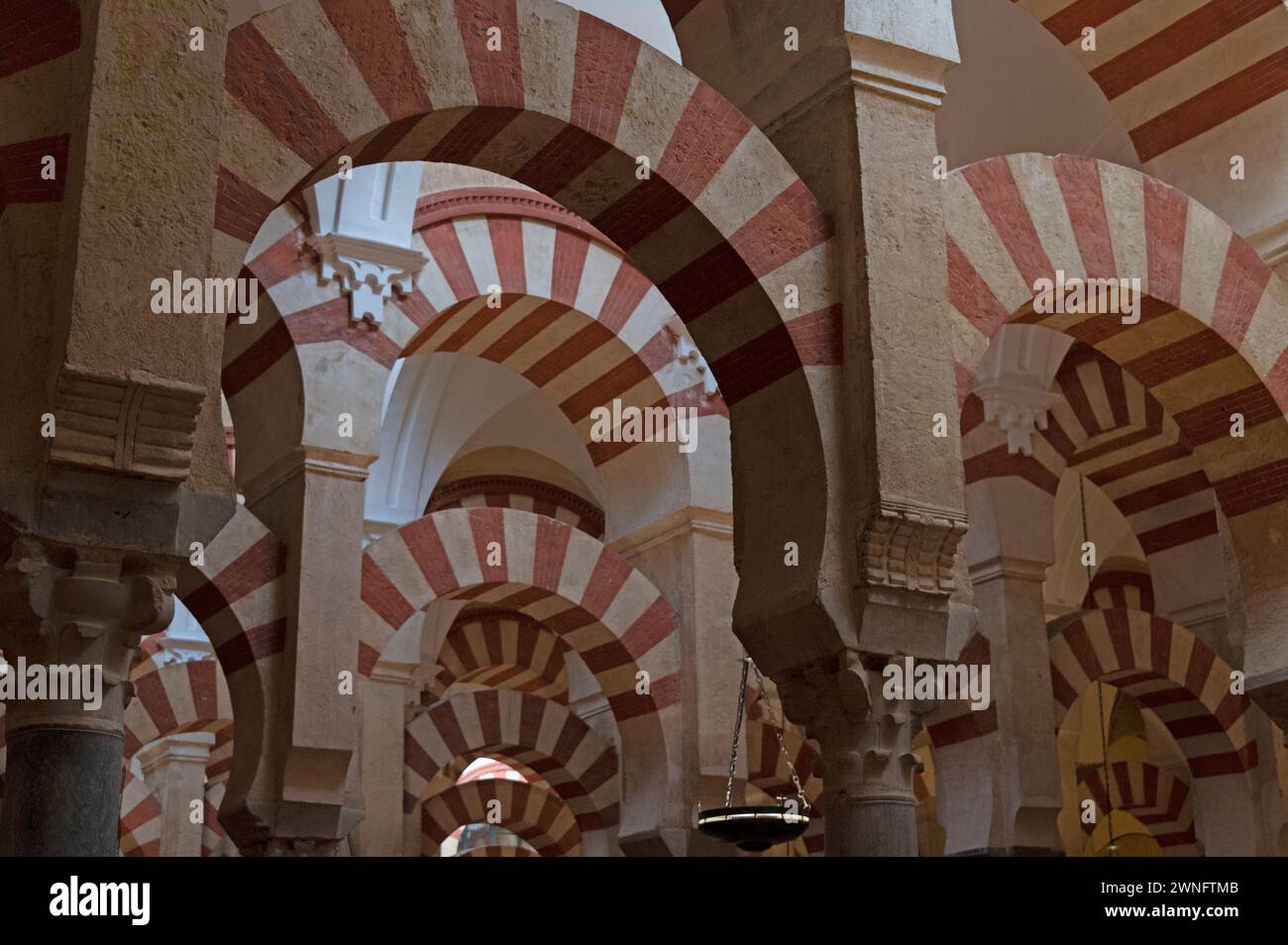 Mosque/ Cathedral of Cordoba Interior and high ceilings supporting a ...