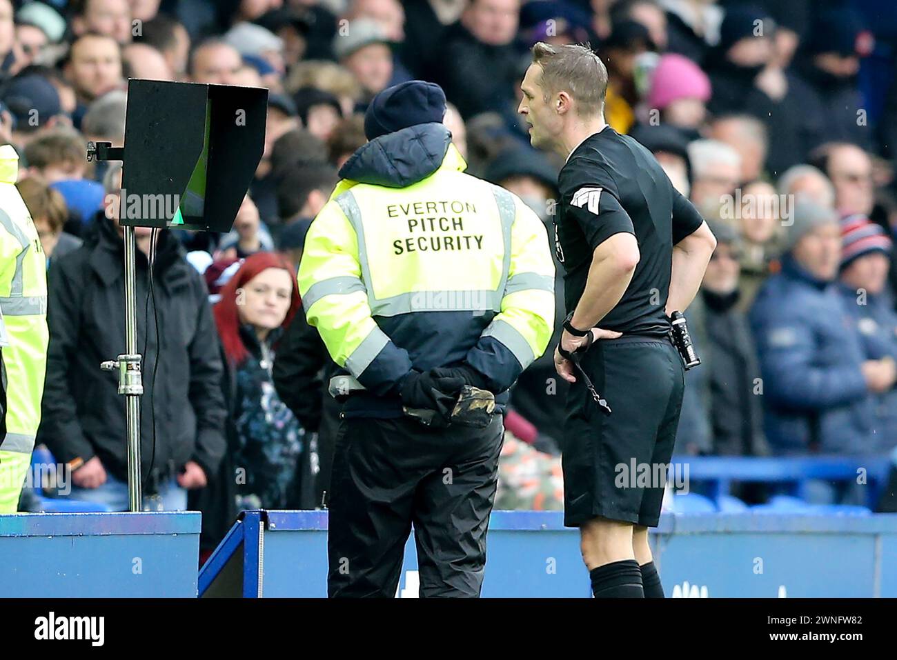 Liverpool, UK. 02nd Mar, 2024. Referee Craig Pawson looks at the VAR ...