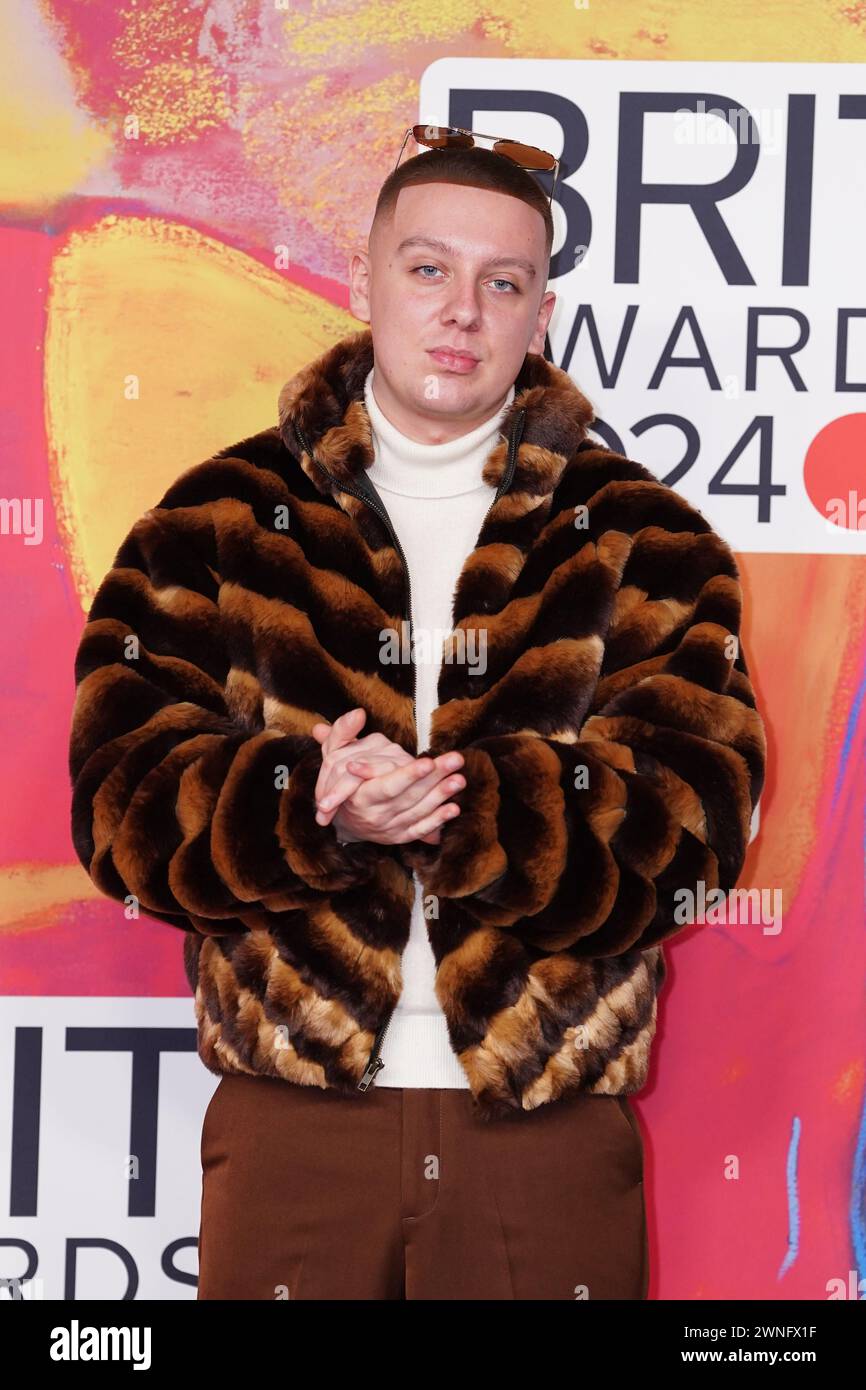Aitch attending the Brit Awards 2024 at the O2 Arena, London. Picture ...