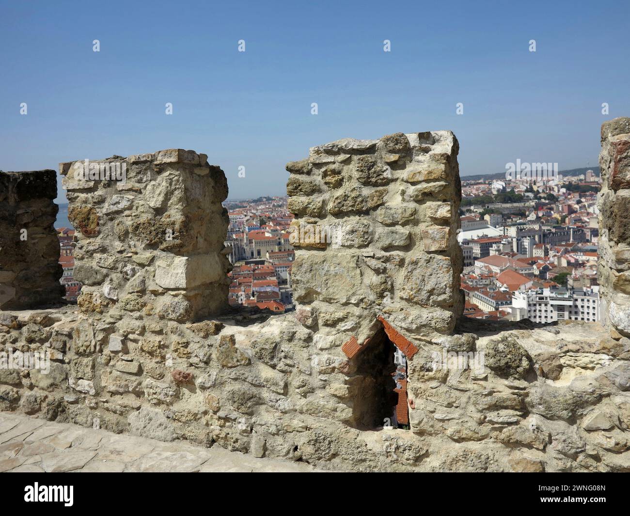 view of Sao Jorge Castle, a Moorish castle which sits on hilltop and ...