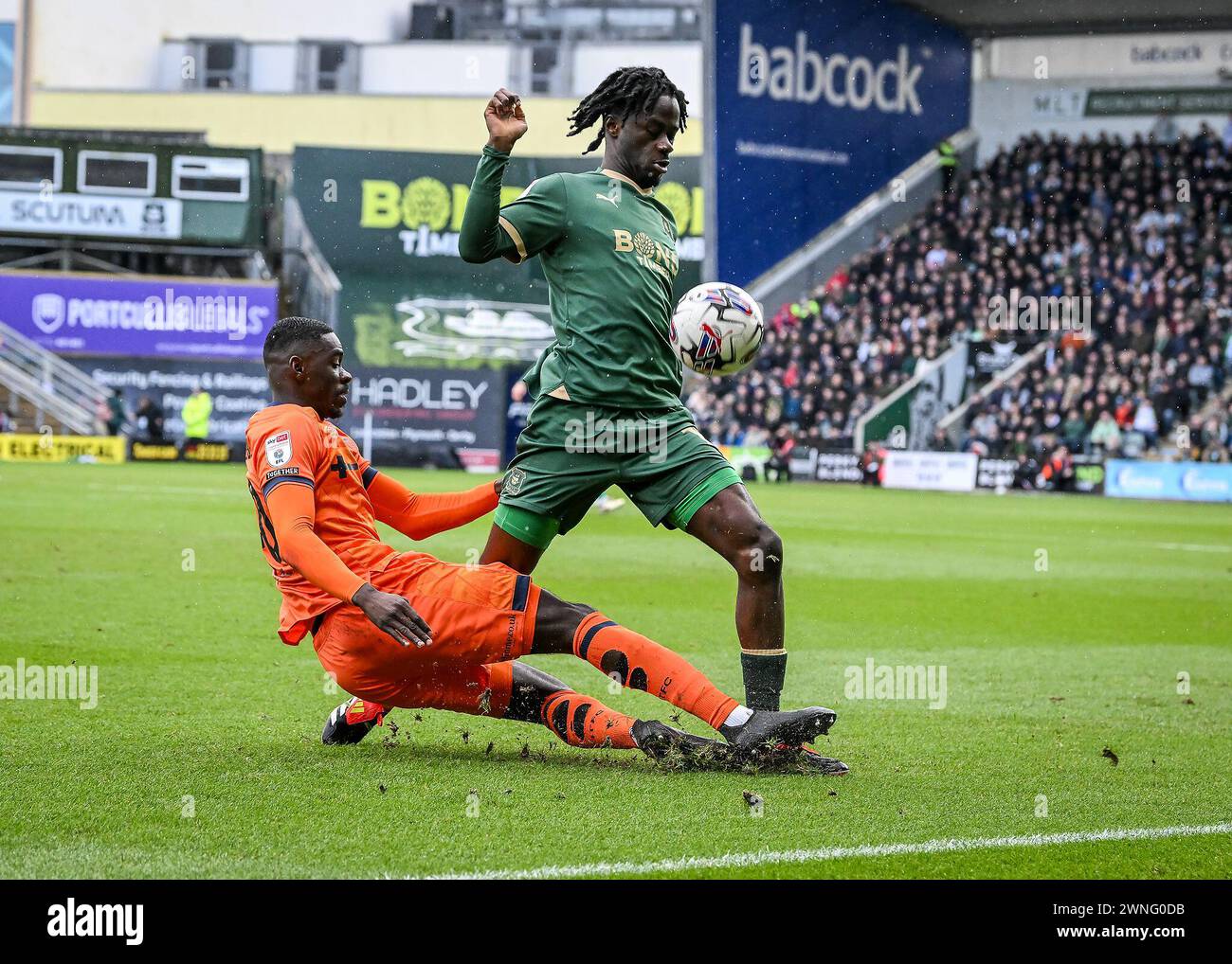 Darko Gyabi of Plymouth Argyle defending during the Sky Bet ...