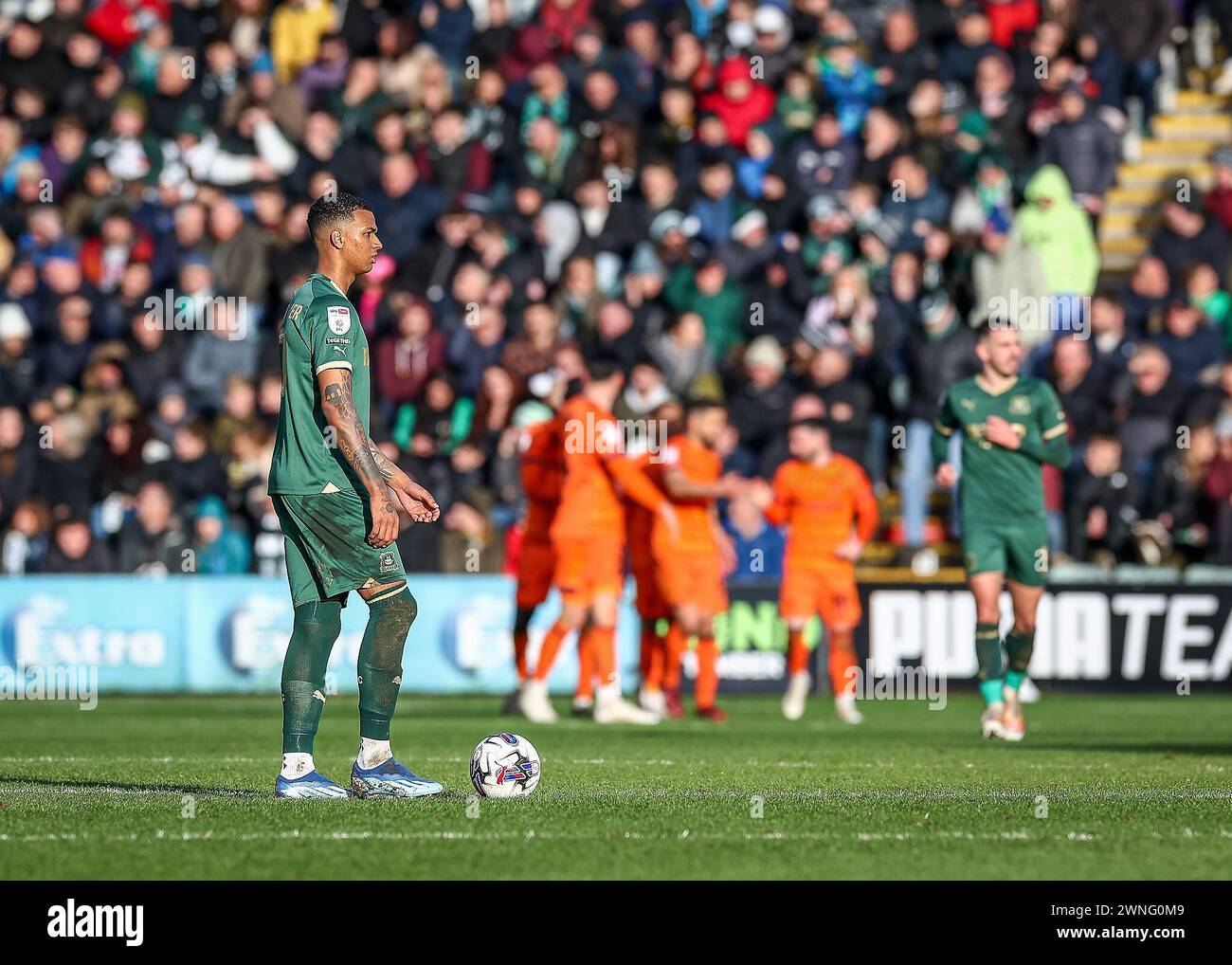 Morgan Whittaker of Plymouth Argyle looks dejected as Kieffer Moore of ...