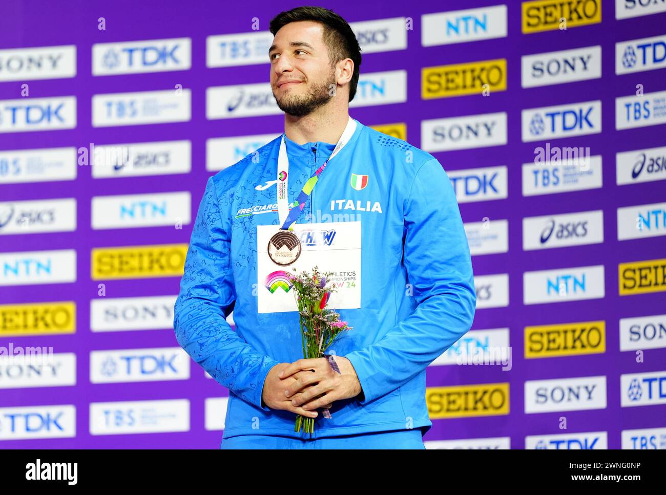 Italy's Leonardo Fabbri celebrates bronze on the podium for the Men's ...