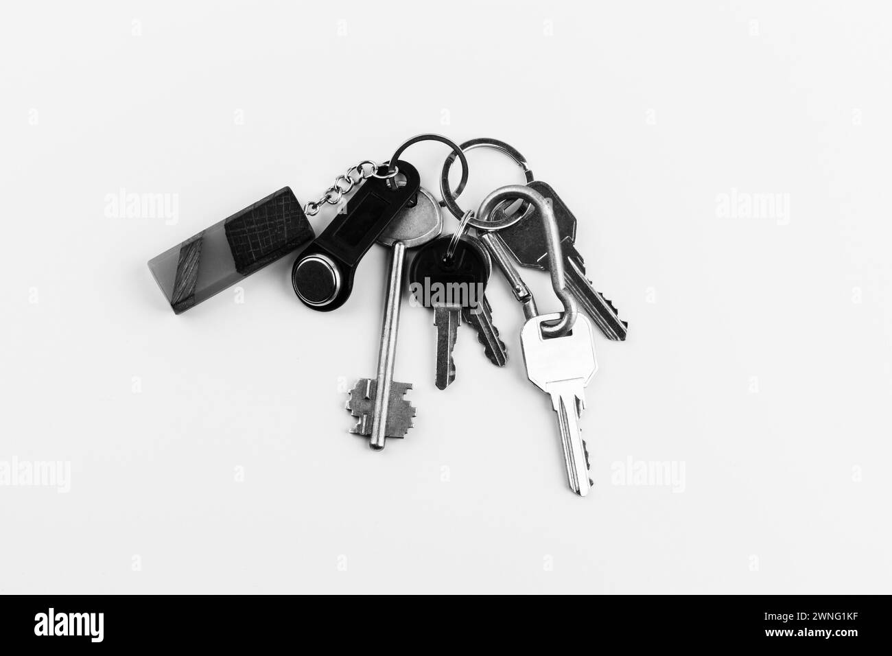 a bunch of door keys with a magnetic security key and epoxy wooden ...