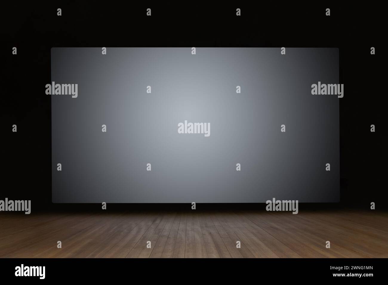 an empty grey screen on a wooden stage in a 3d movie theater Stock ...