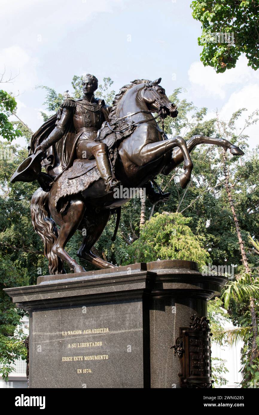 bronze statue of Simon Bolivar, with a dove on his shoulder, in square ...