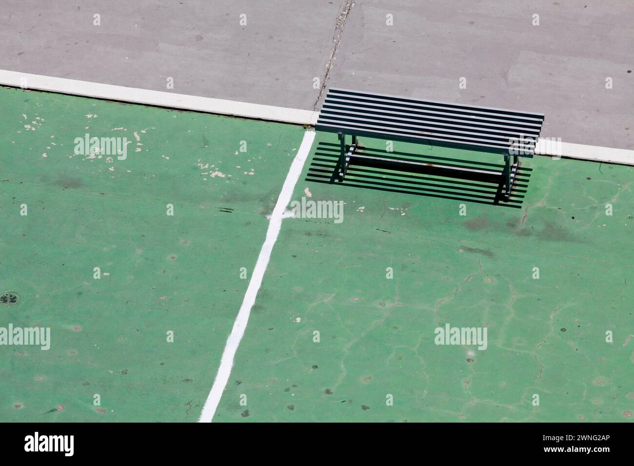 view of old and abandoned playground with bench Stock Photo - Alamy