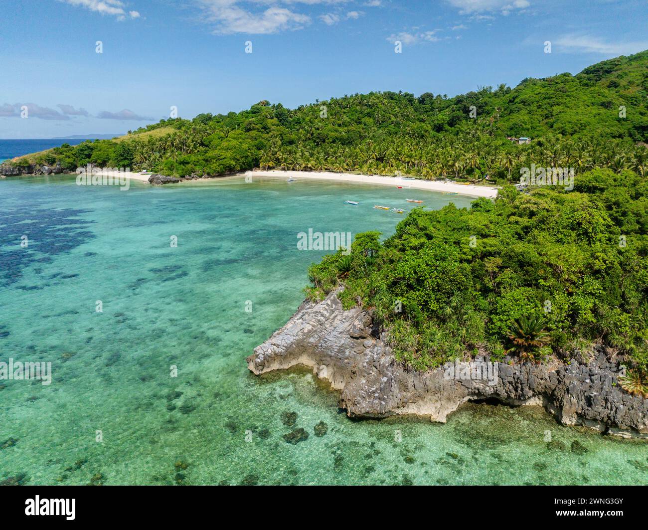 Drone view of tropical beach with corals and clear water. Cobrador ...
