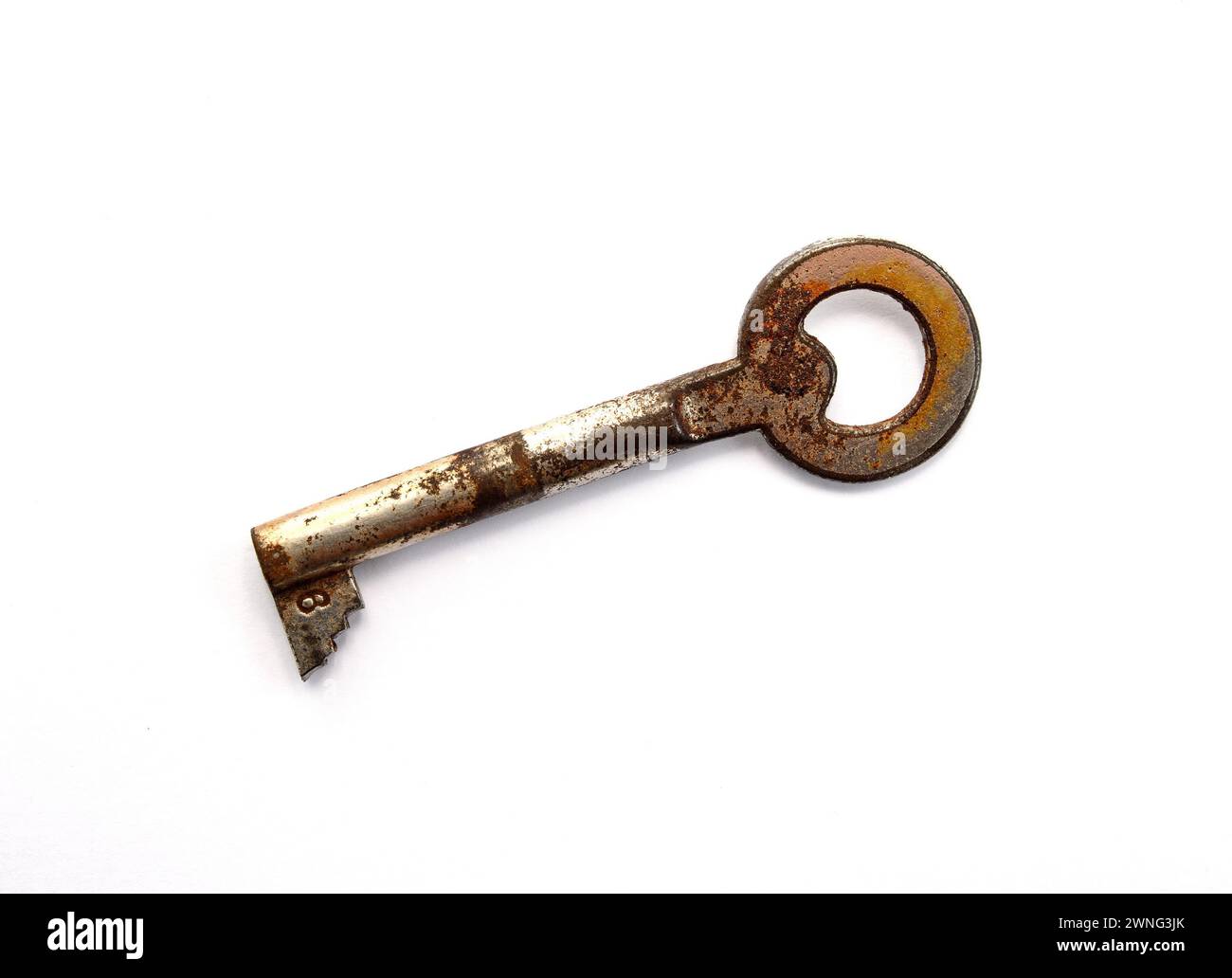Old key isolated on white background Stock Photo - Alamy