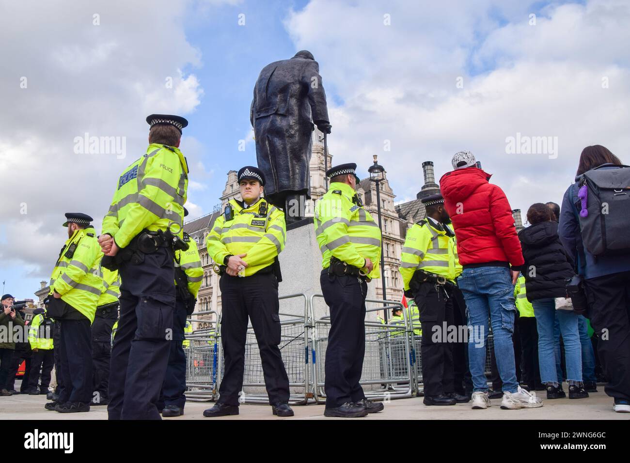 London, UK. 2nd March 2024. Police officers guard the statue of Winston ...