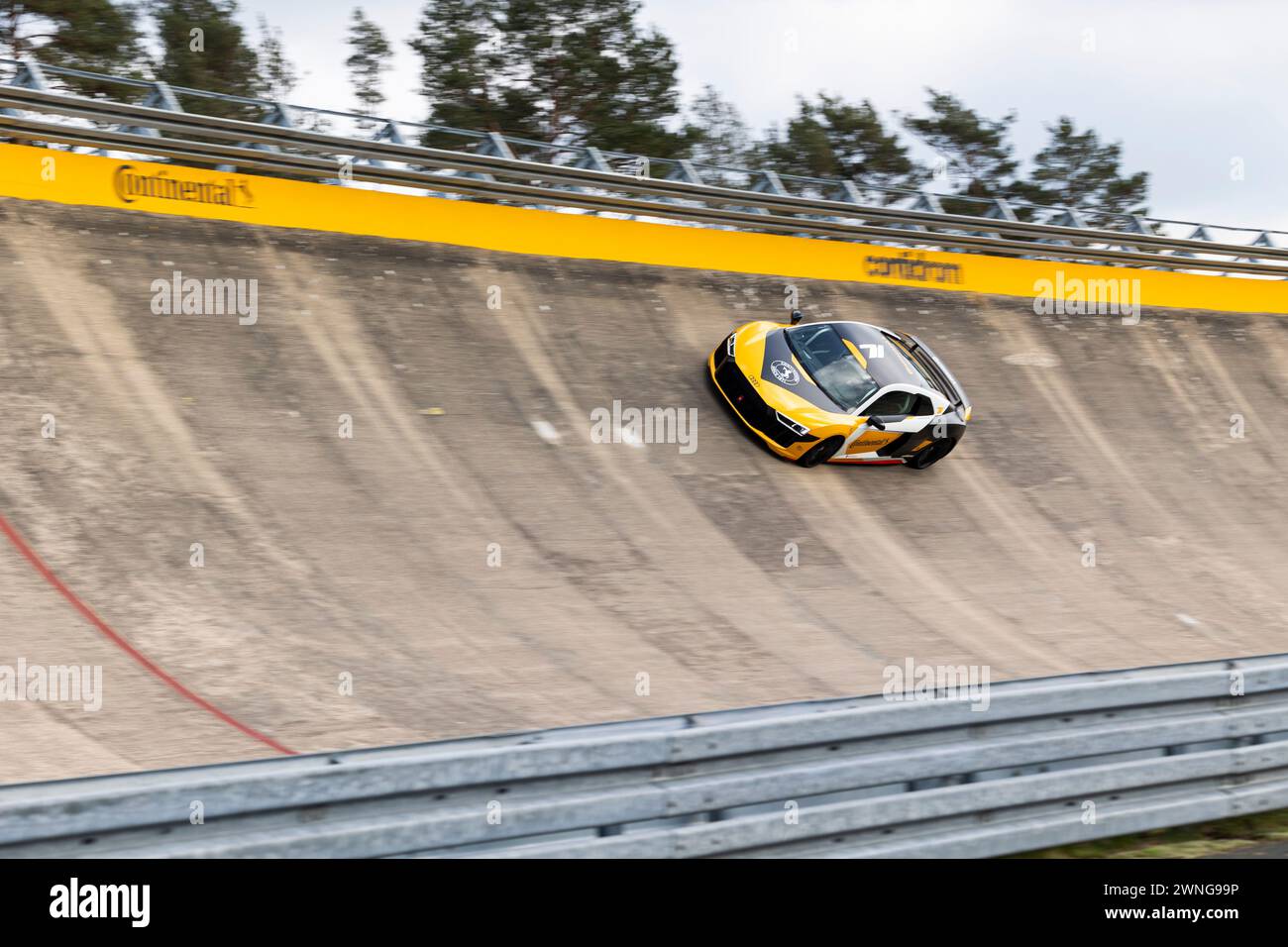 Wietze, Germany. 01st Mar, 2024. An Audi R8 car drives through a steep ...