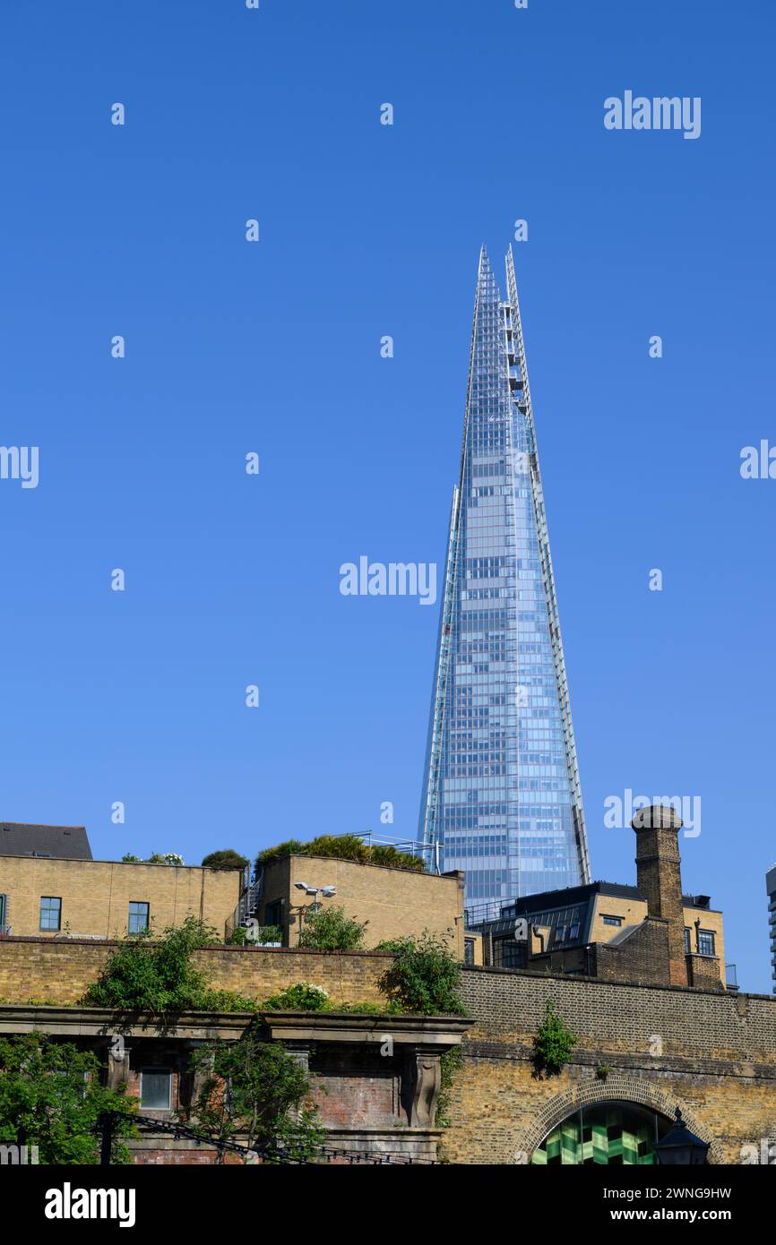 The Shard skyscraper towers over the arches of Bank End, Bankside ...