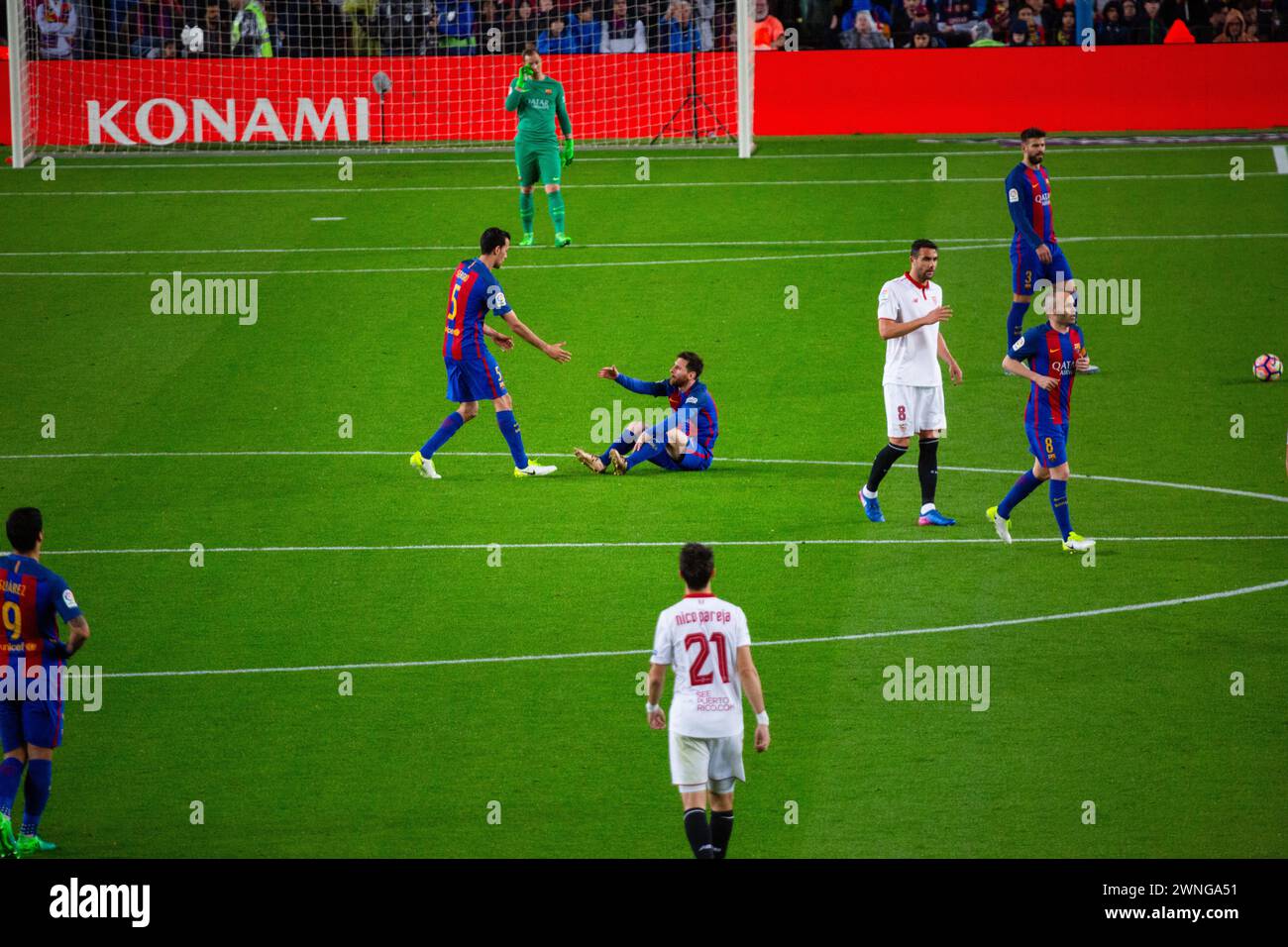 SERGIO BUSQUETS, MESSI, BARCELONA FC, 2017: Sergio Busquetshelps Lionel ...