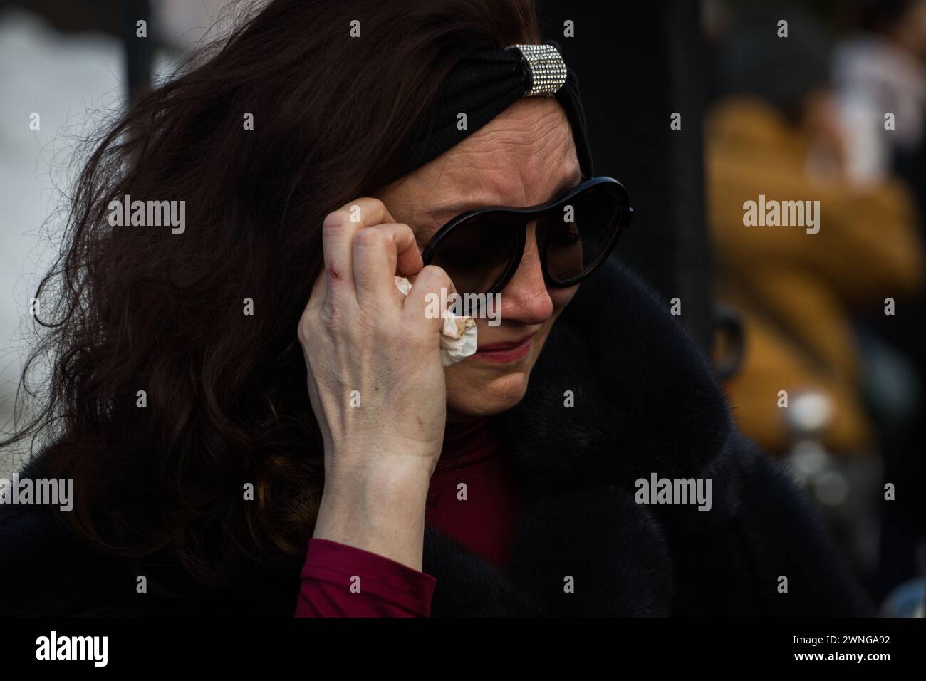 Moscow, Russia. 2nd Mar, 2024. A woman mourns at the grave of Russian ...
