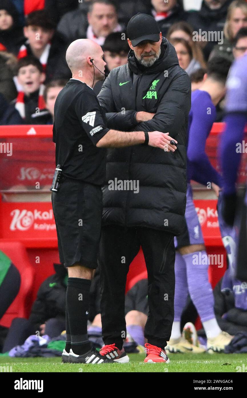 Referee Paul Tierney has words with Jurgen Klopp, manager of Liverpool ...