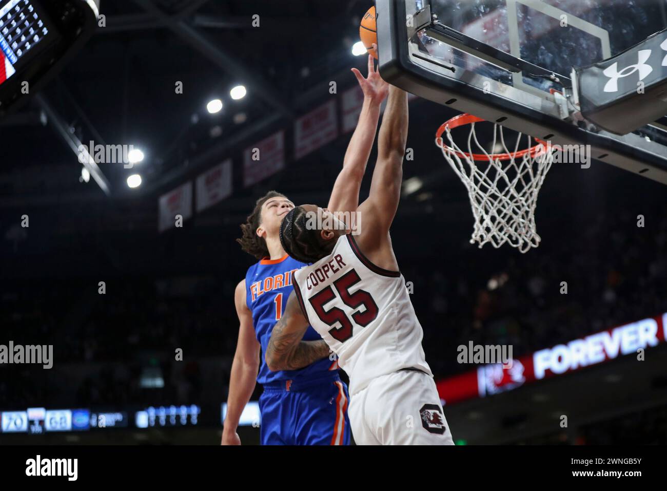 Florida guard Walter Clayton Jr. (1) blocks the layup attempt by South ...