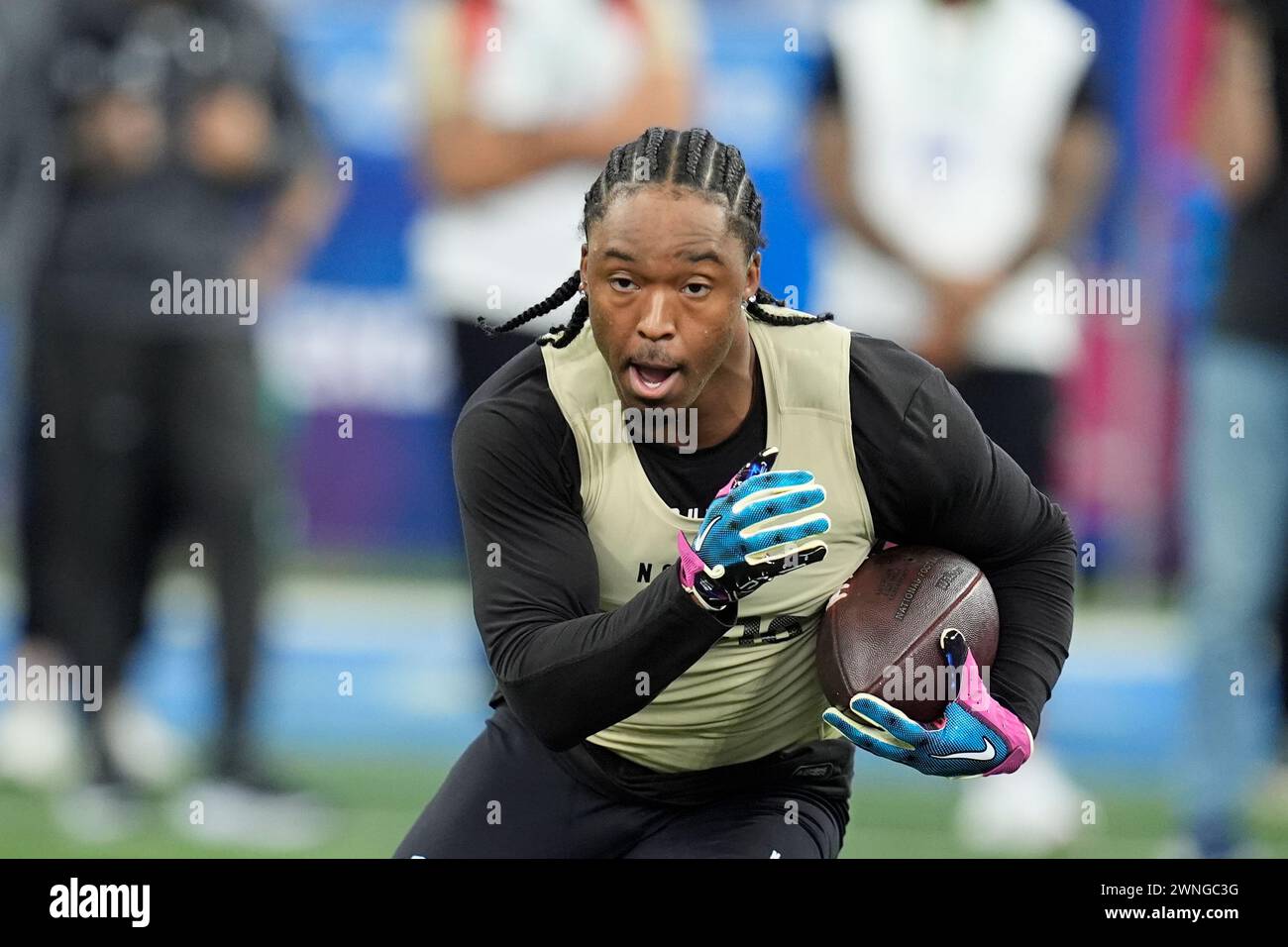 Louisville running back Jawhar Jordan runs a drill at the NFL football ...