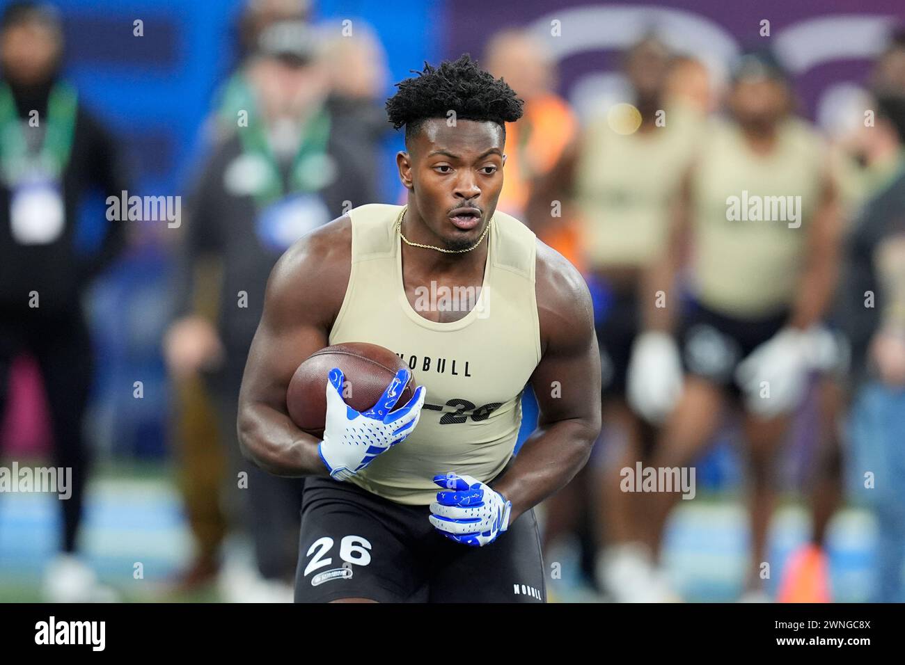 Troy running back Kimani Vidal runs a drill at the NFL football ...