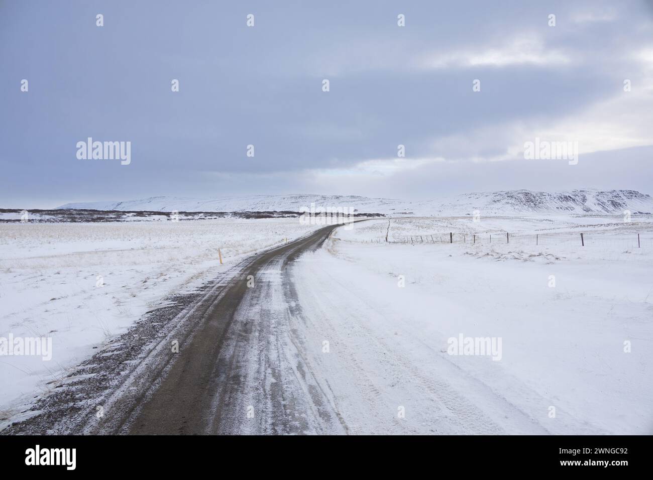 icy road in an icelandic winter Stock Photo - Alamy