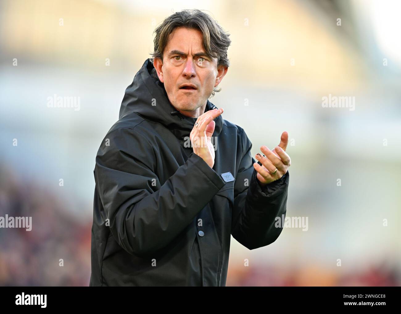 London, UK. 02nd Mar, 2024. Thomas Frank manager of Brentford claps ...